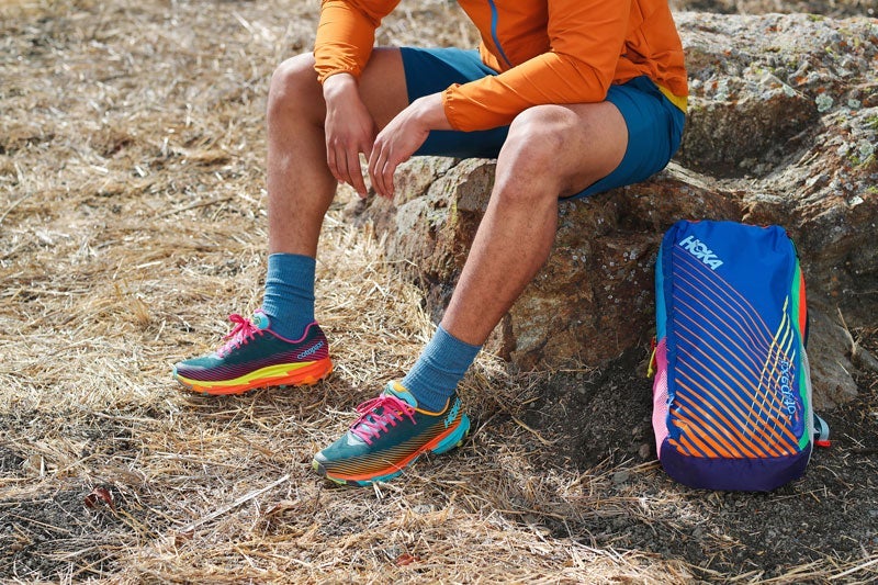 HOKA and Cotopaxi Collaborate on Colorful Gear for Good
