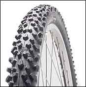 Do tires with bigger knobbies grip better in mud?